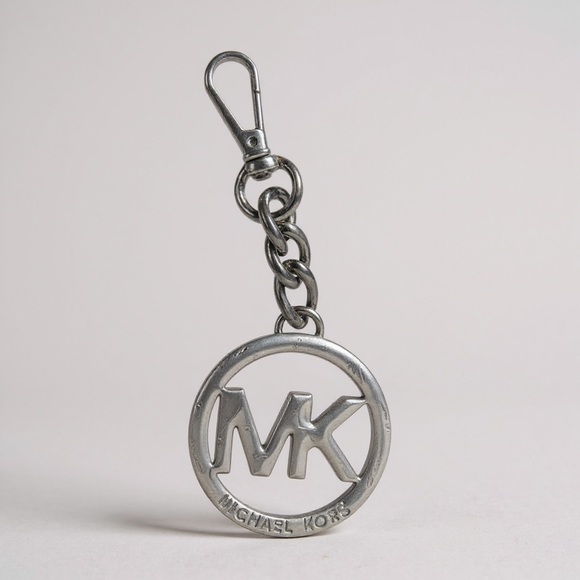 Michael Kors | Bags | Michael Kors Silvertone Mk Logo Bag Charm ...